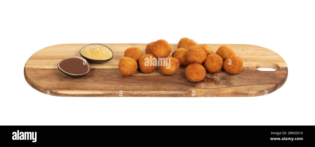 Dutch traditional snack bitterbal on a serving board, isolated Stock ...