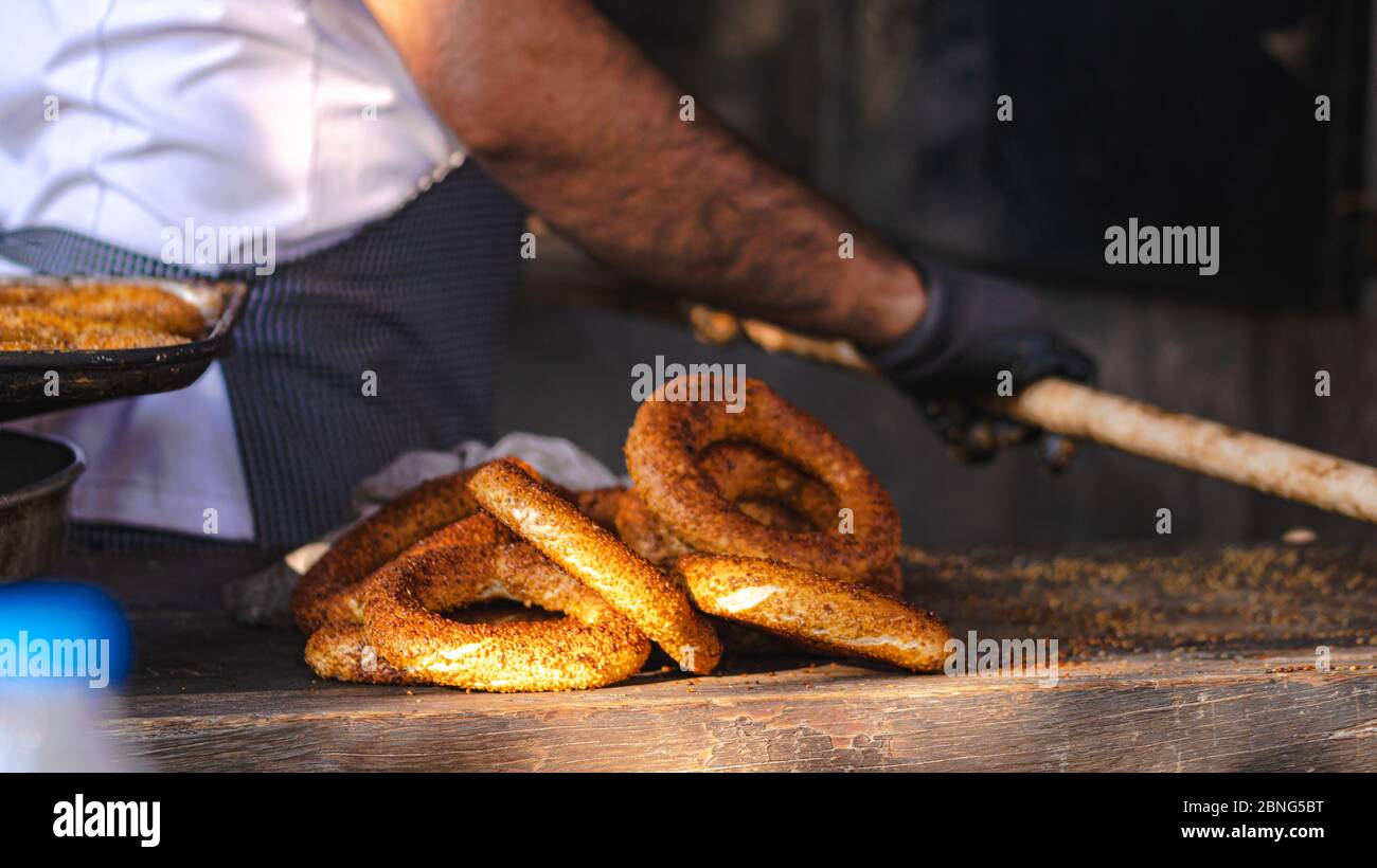 Simit in hand hi-res stock photography and images - Alamy