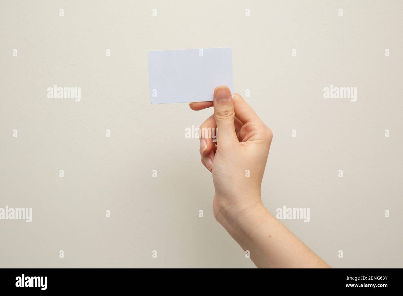hand holding white card Stock Photo - Alamy