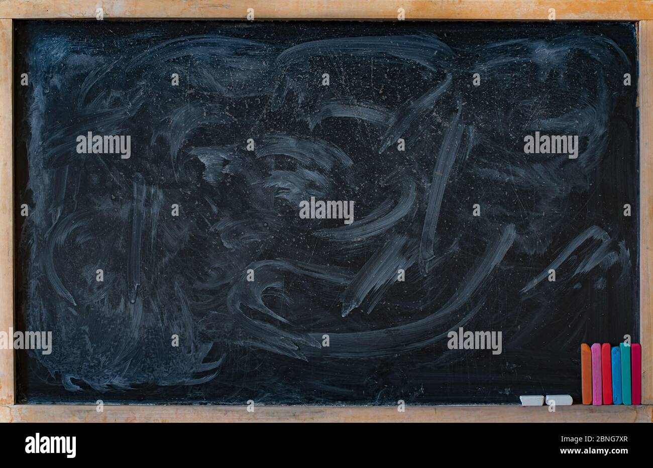 Dark chalk board with colored pencils for drawing. copy space Stock ...