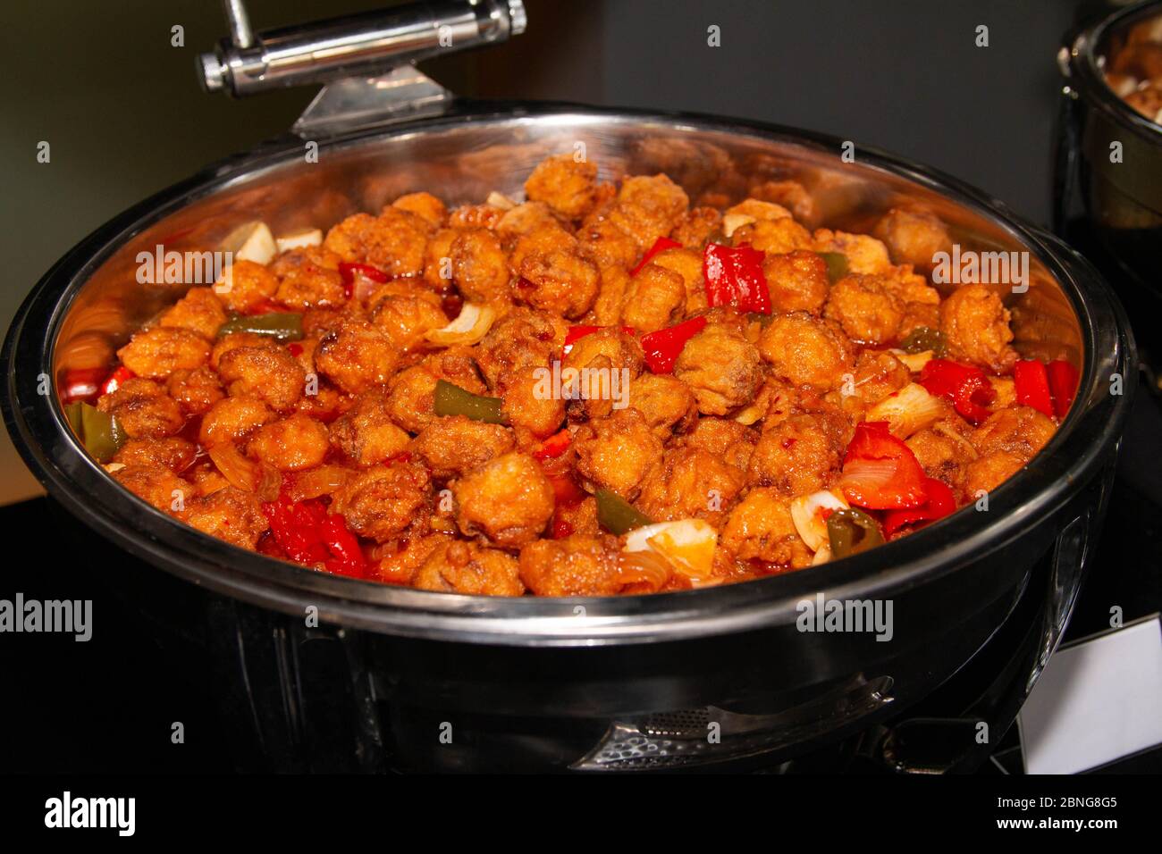 Large bowl of spicy meatball on a buffet tray Stock Photo - Alamy