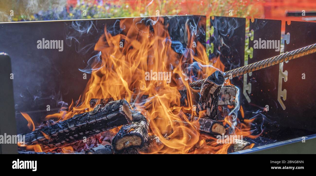 Beautiful flames and fire with smoke Stock Photo - Alamy