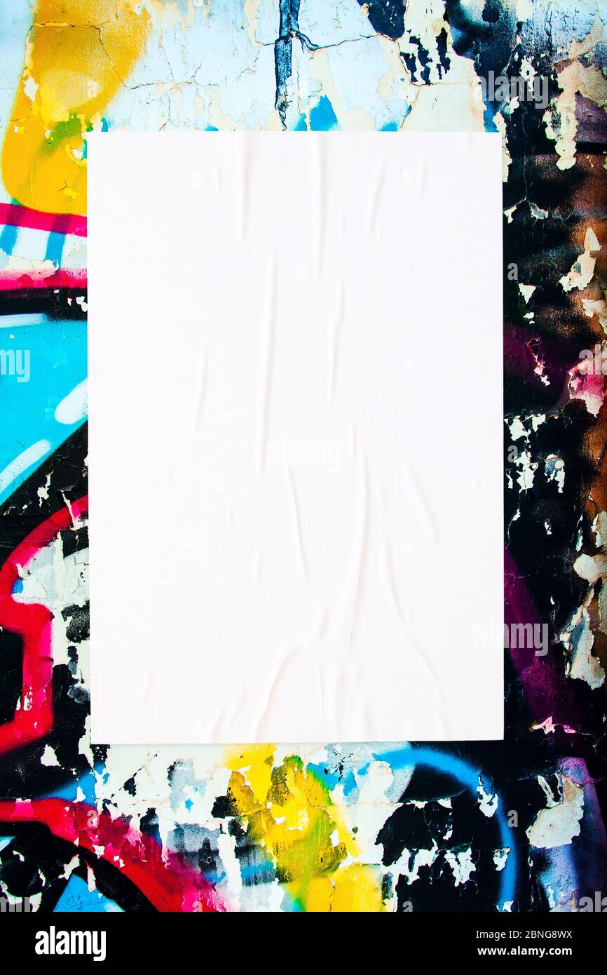 close up of colorful messy painted urban wall texture with wrinkled ...