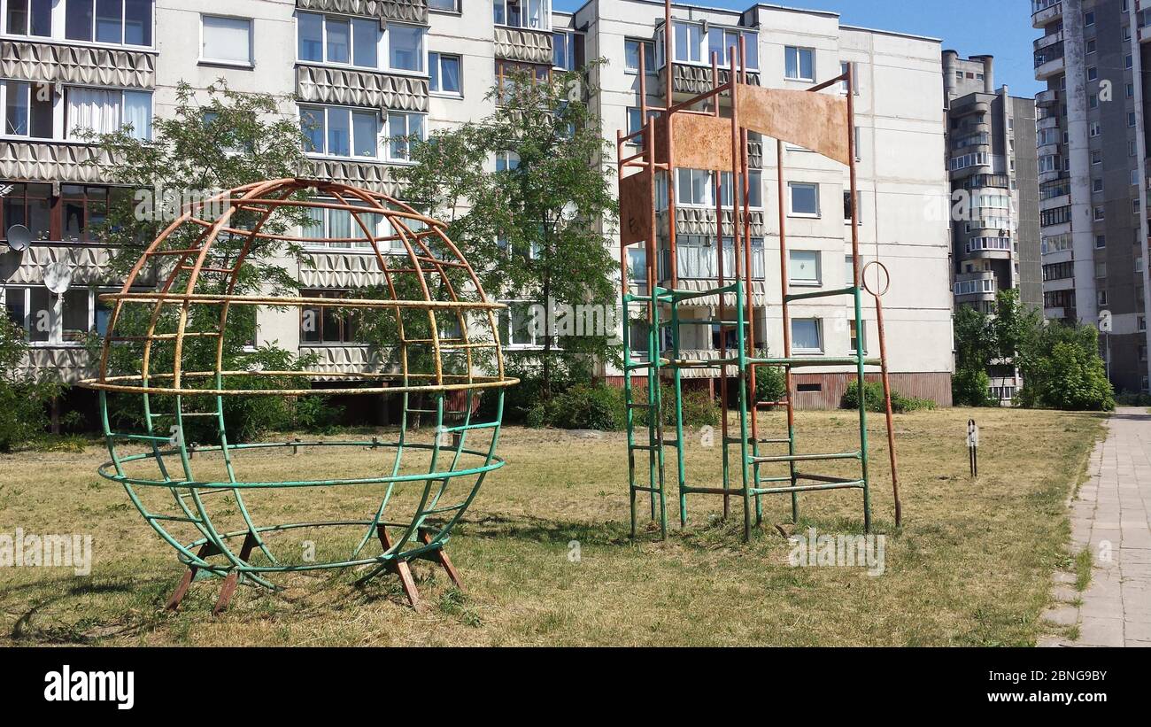 Soviet times playground and apartment buildings Stock Photo - Alamy