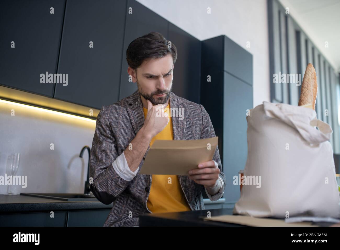 Man looking list hi-res stock photography and images - Alamy