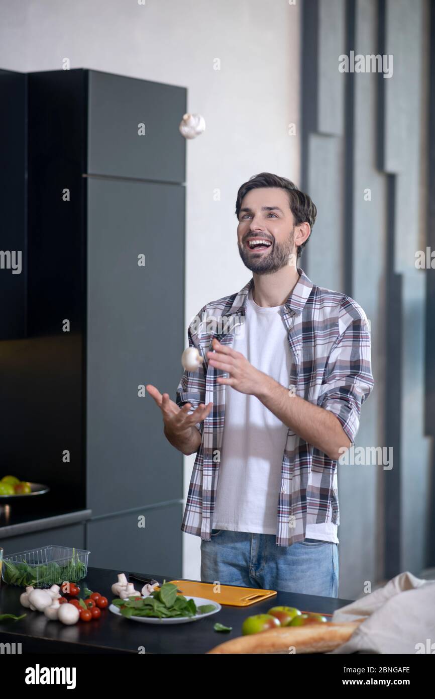 Man tossing hi-res stock photography and images - Alamy