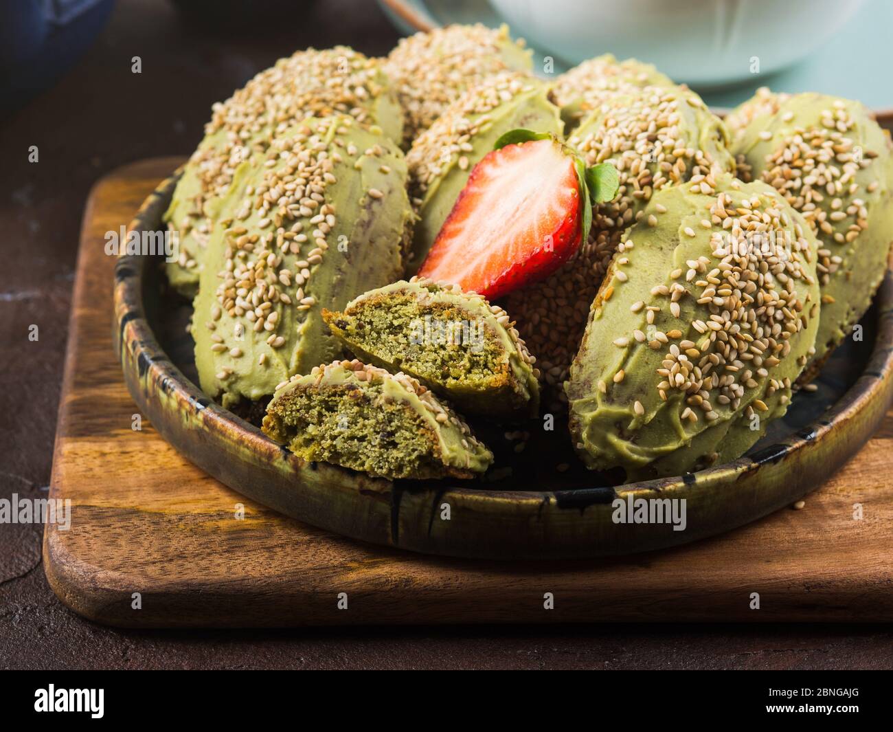 Matcha madeleine cookies with chocolate frosting Stock Photo - Alamy