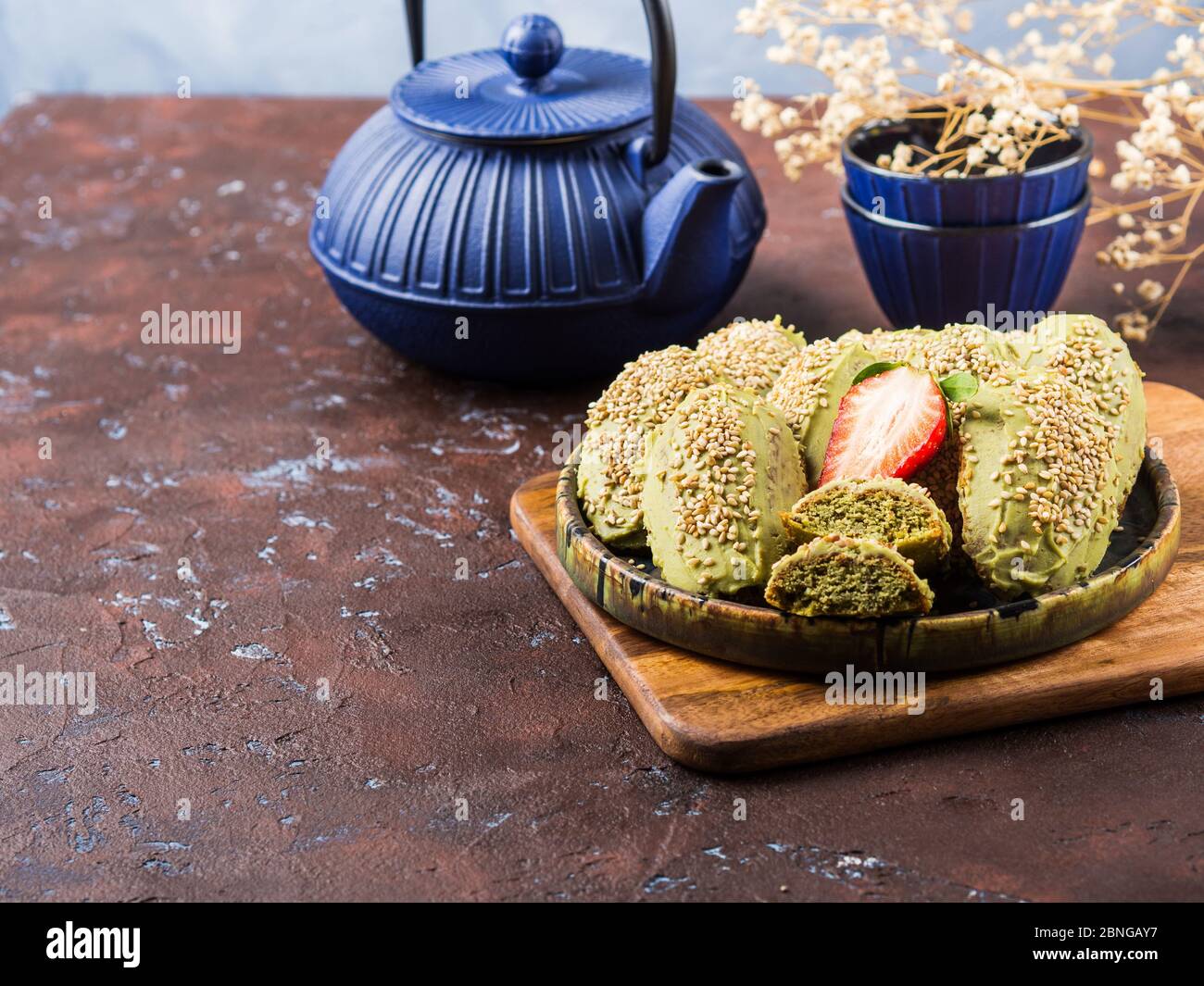 Matcha madeleine cookies with chocolate frosting Stock Photo - Alamy