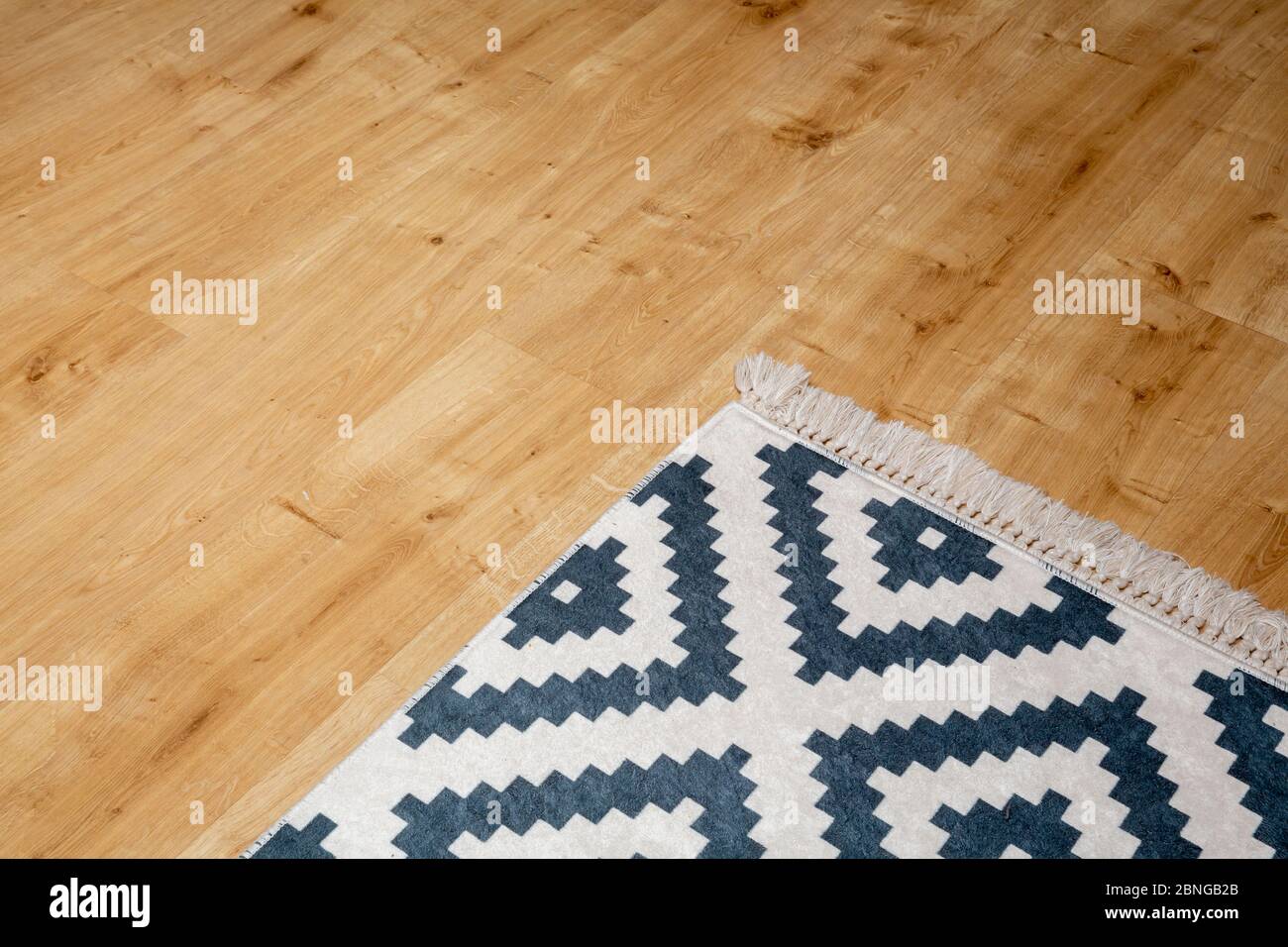 carpet standing on the floor Stock Photo - Alamy
