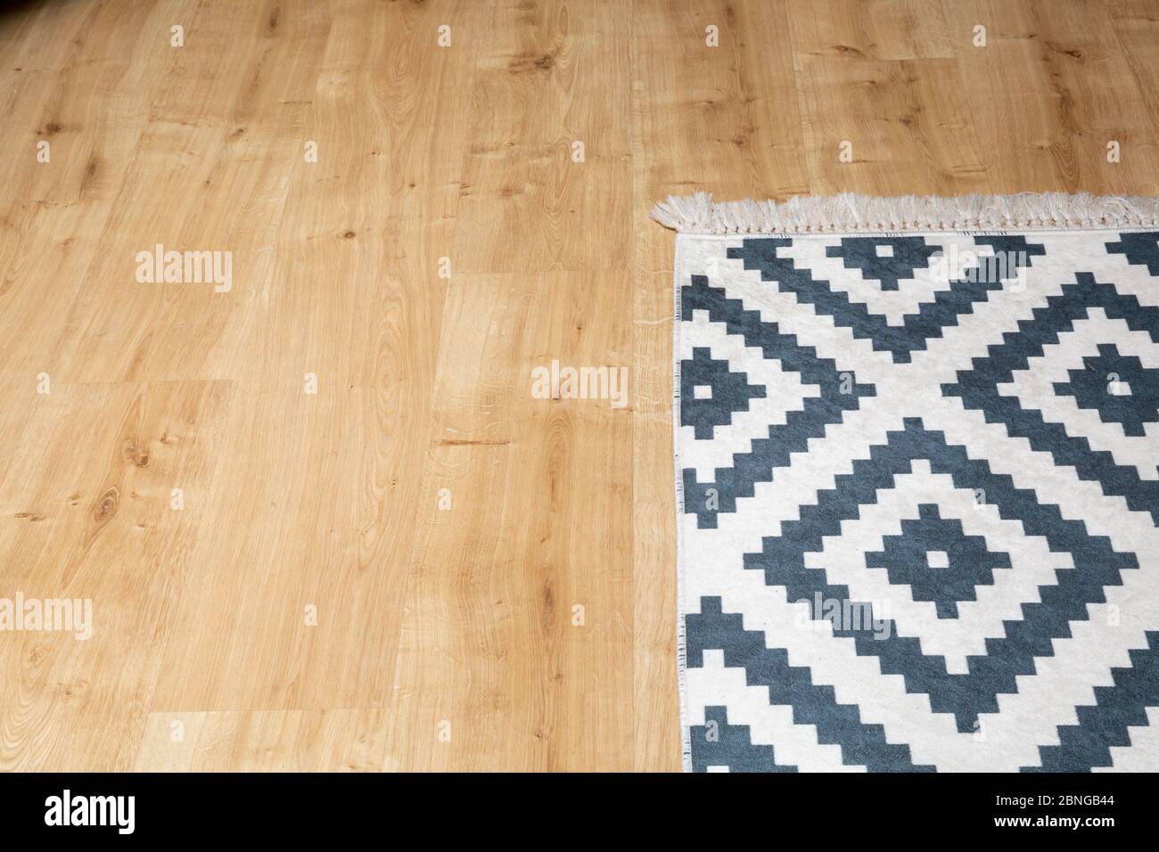 carpet standing on the floor Stock Photo - Alamy
