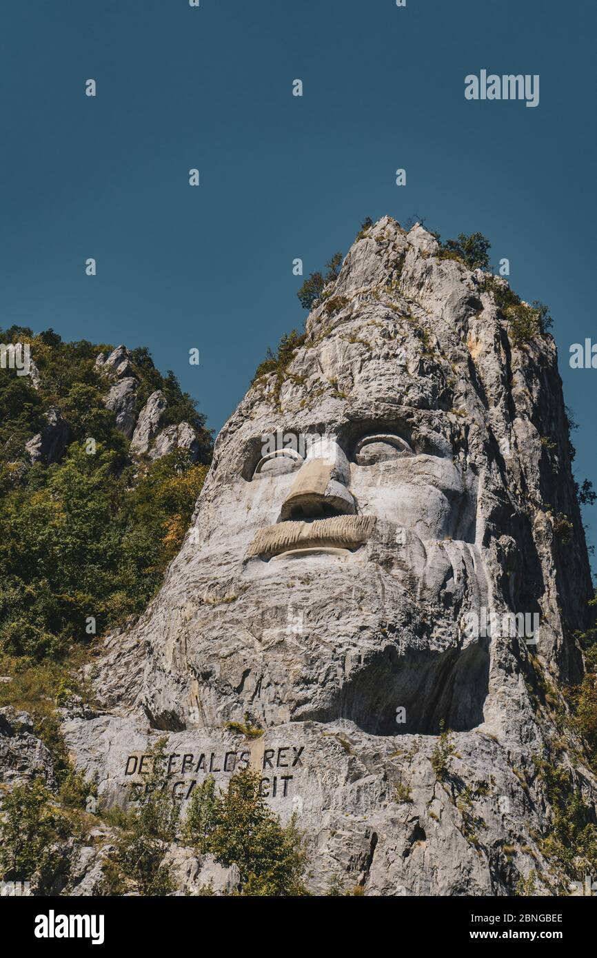 Vertical shot of the magnificent Rock Sculpture of Decebalus captured ...