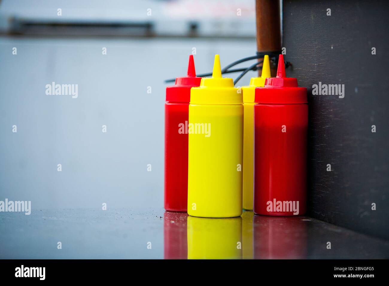 Bottles of ketchup and mustard during daytime Stock Photo - Alamy