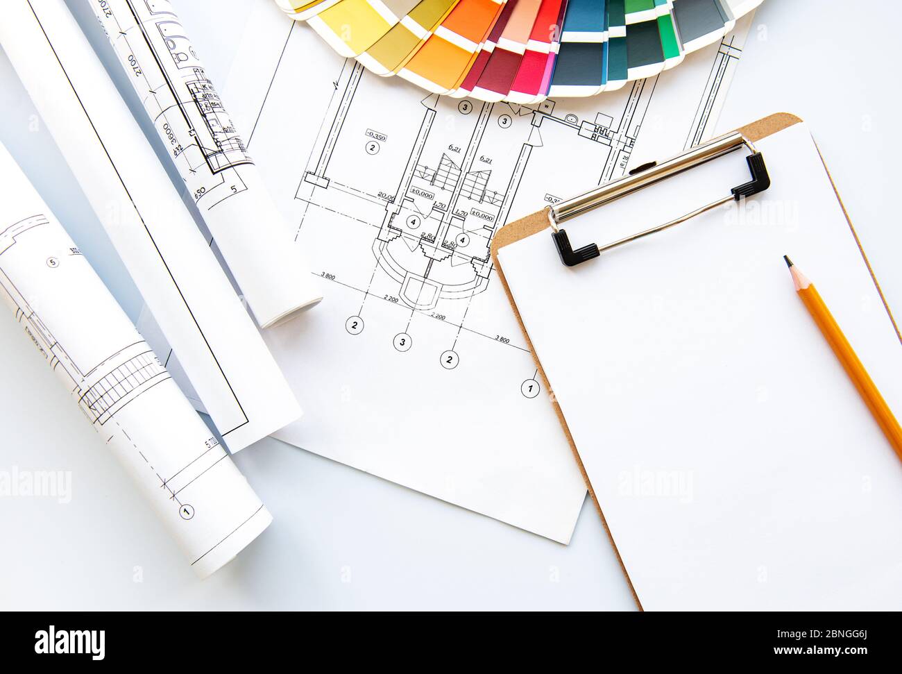 Architect workplace top view. Architectural project, blueprints ...