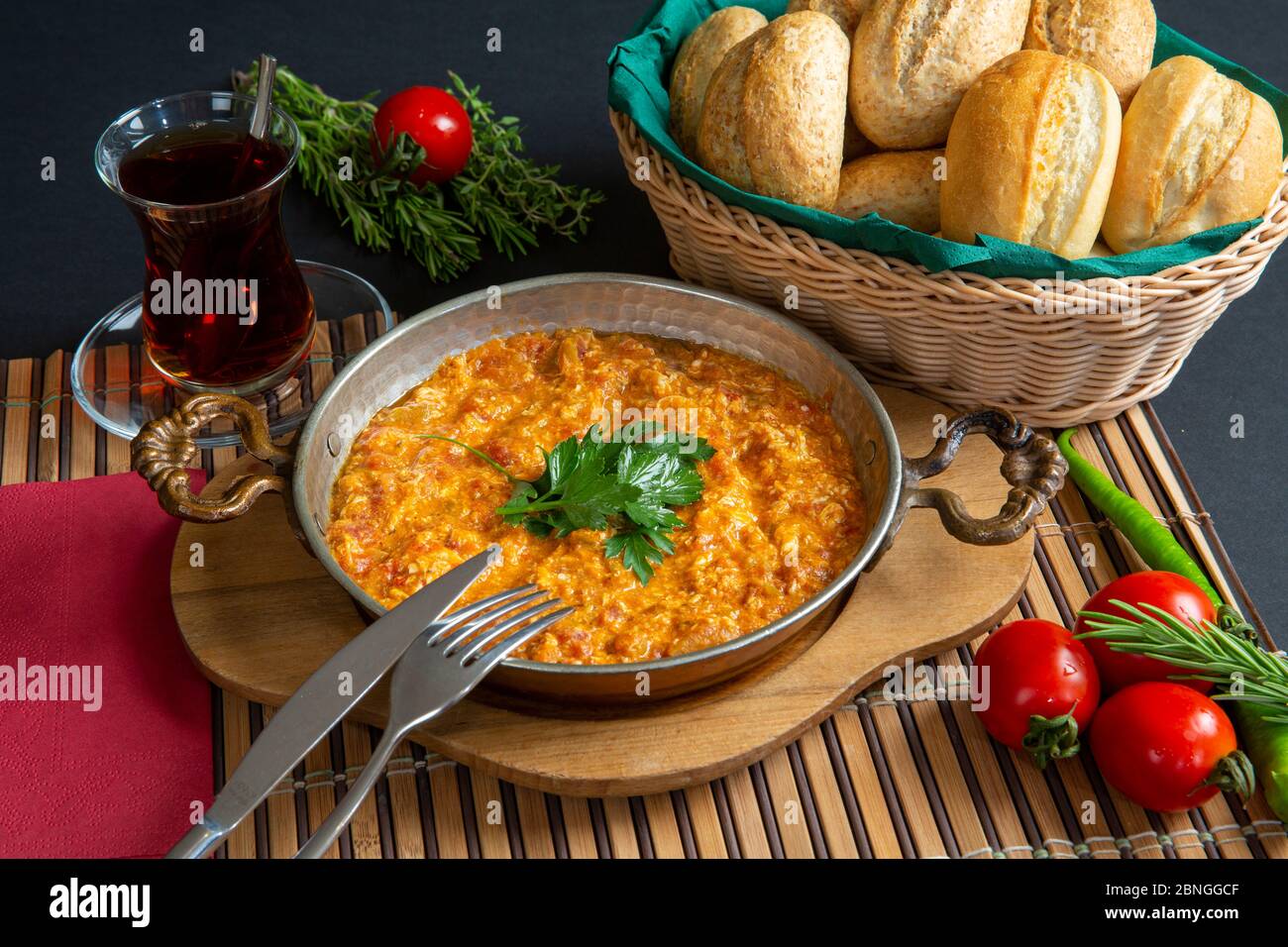 top view, traditional turkish breakfast meal melemen. eggs in a metal ...