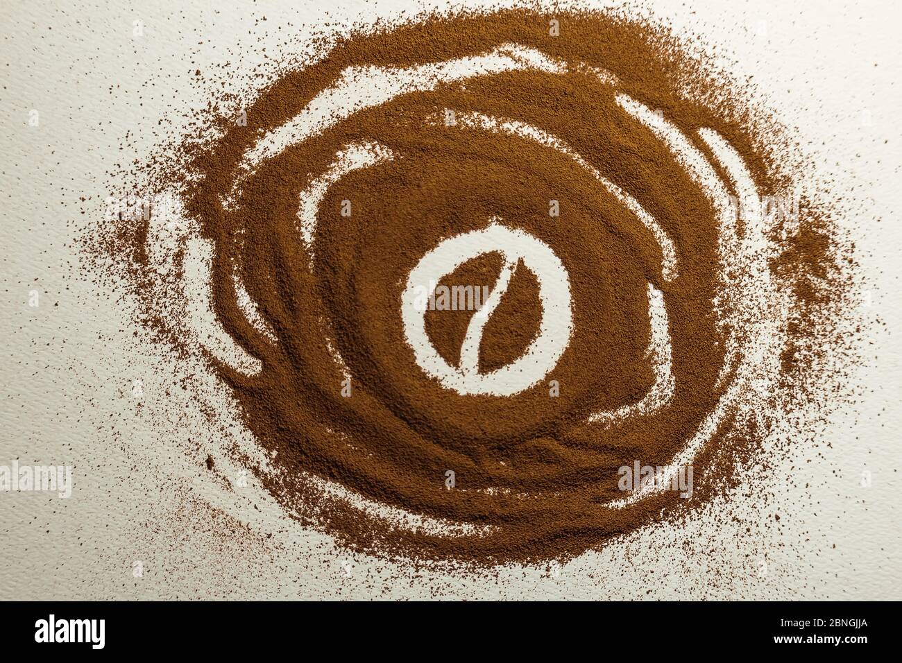 Coffee bean paint in coffee powder on textured background Stock Photo ...