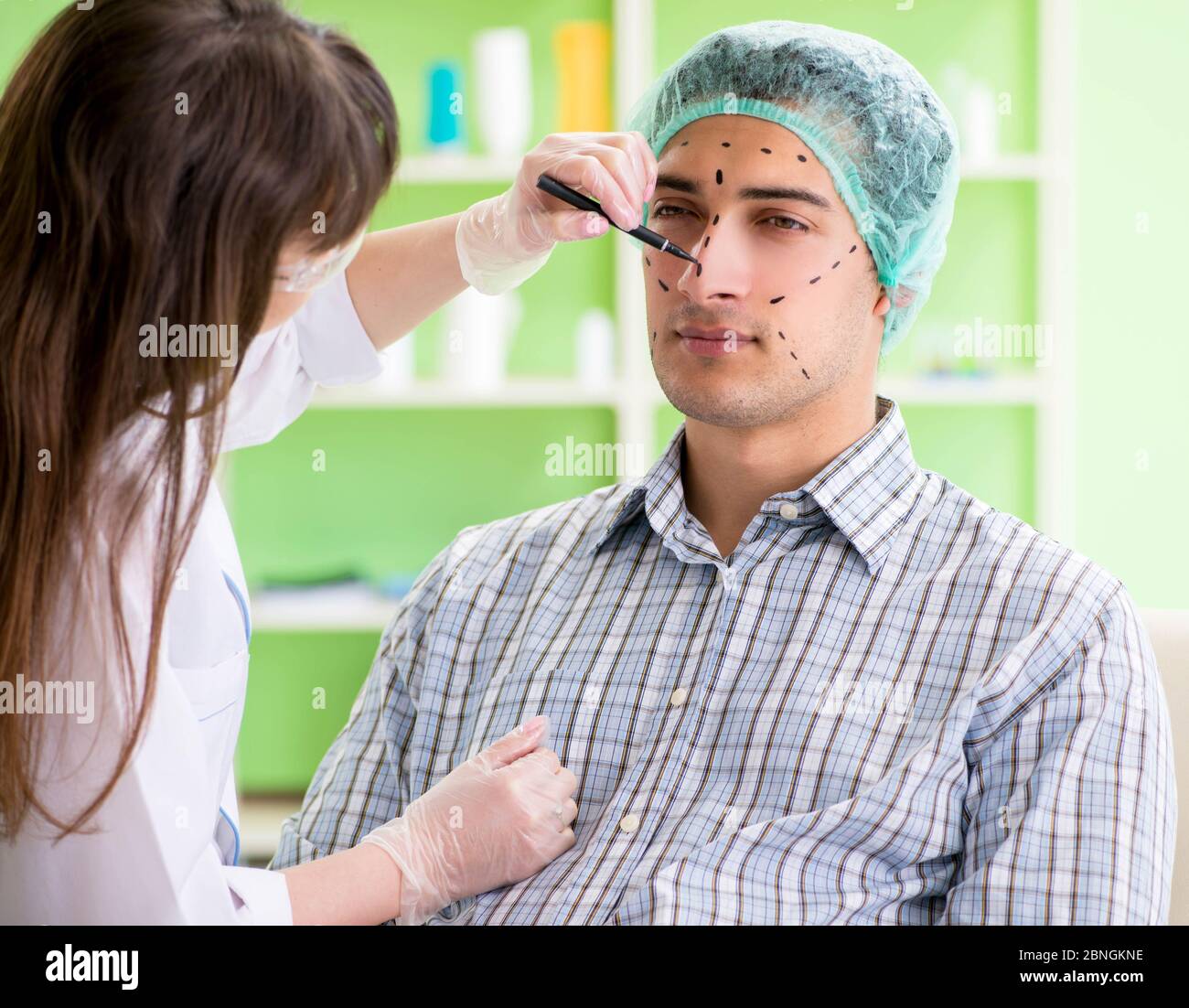 The plastic surgeon preparing for operation on man face Stock Photo - Alamy