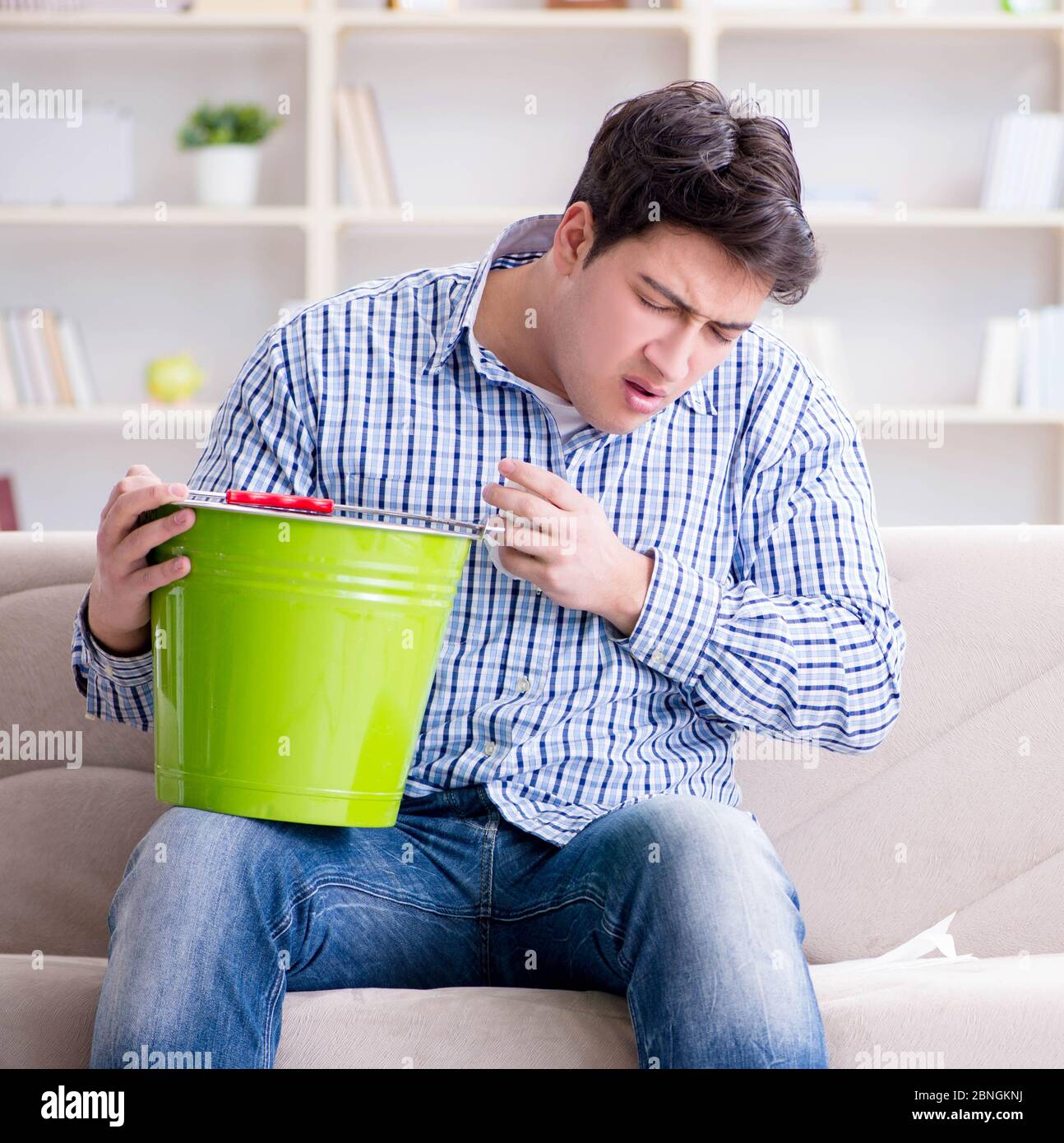 The sick man suffering at home from infection and bad stomach Stock ...