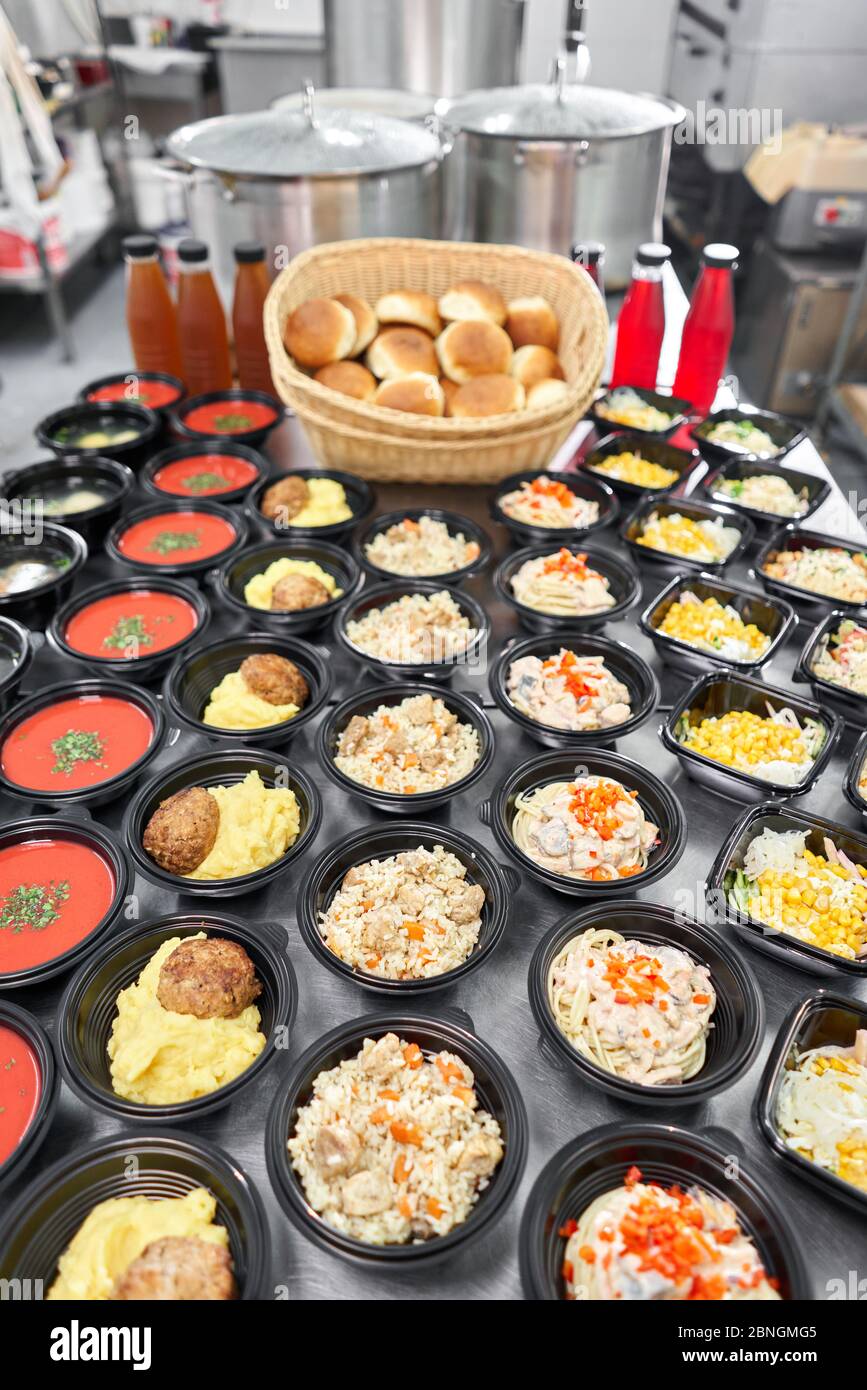 Food delivery. Different in plastic disposable lunch box with healthy ...