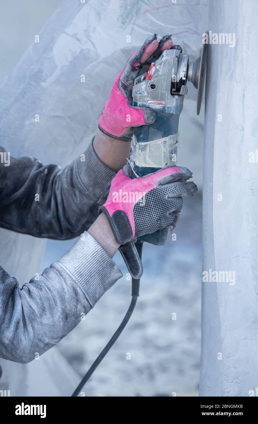 Hand cutting stone hi-res stock photography and images - Alamy