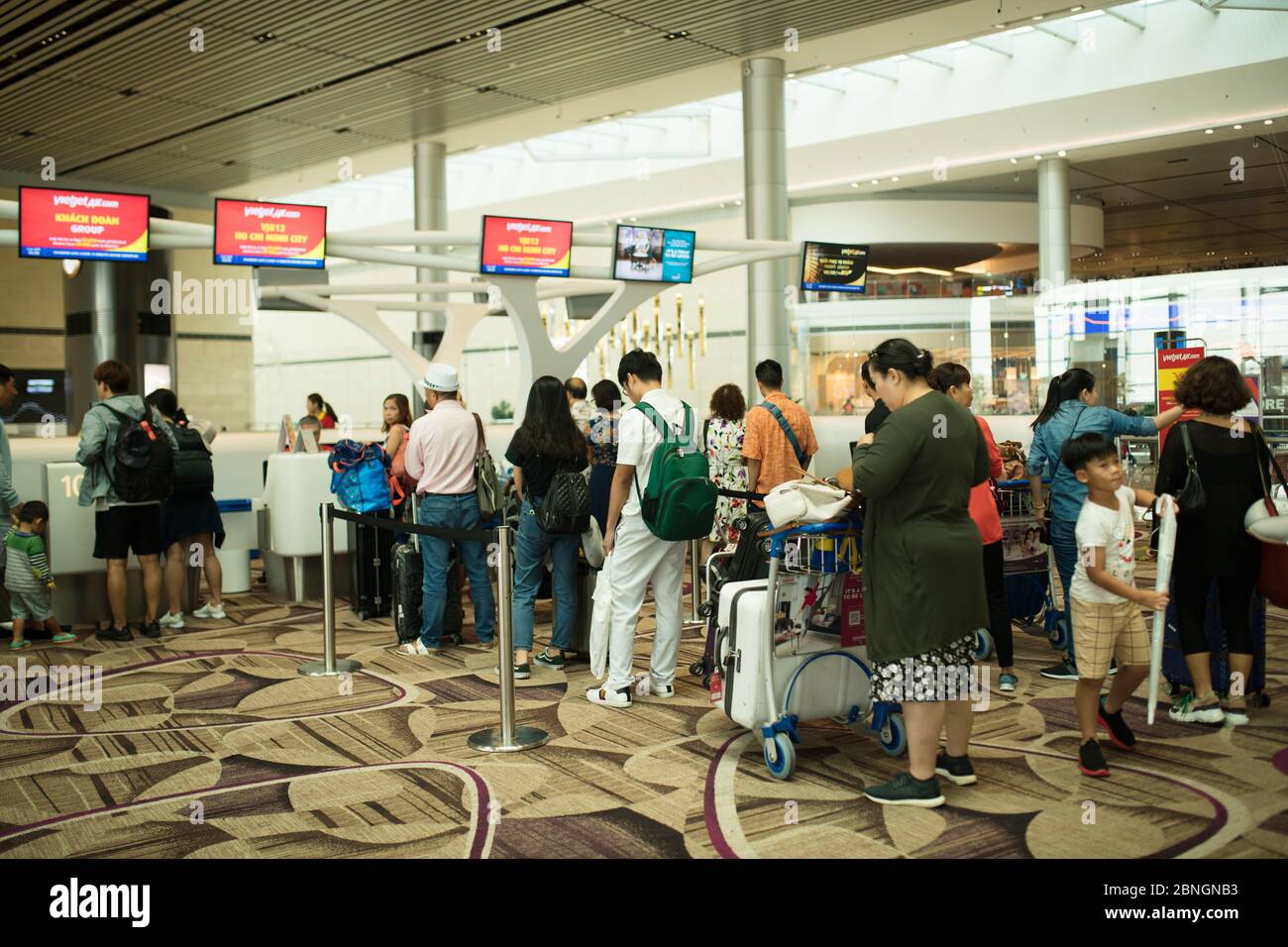 Singapore - June, 2019: People queue on passport control at arrival ...
