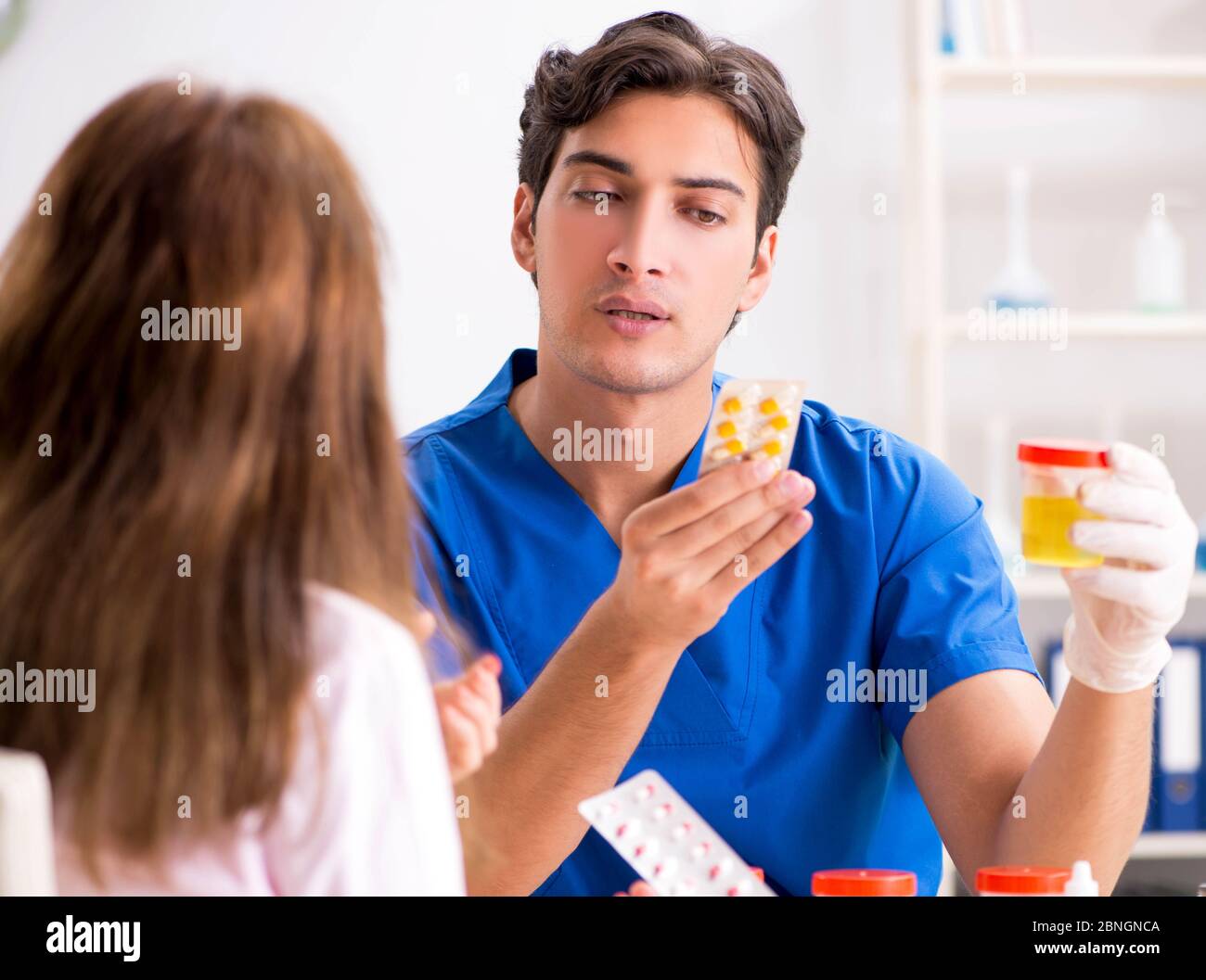The patient visiting doctor for urine test Stock Photo - Alamy