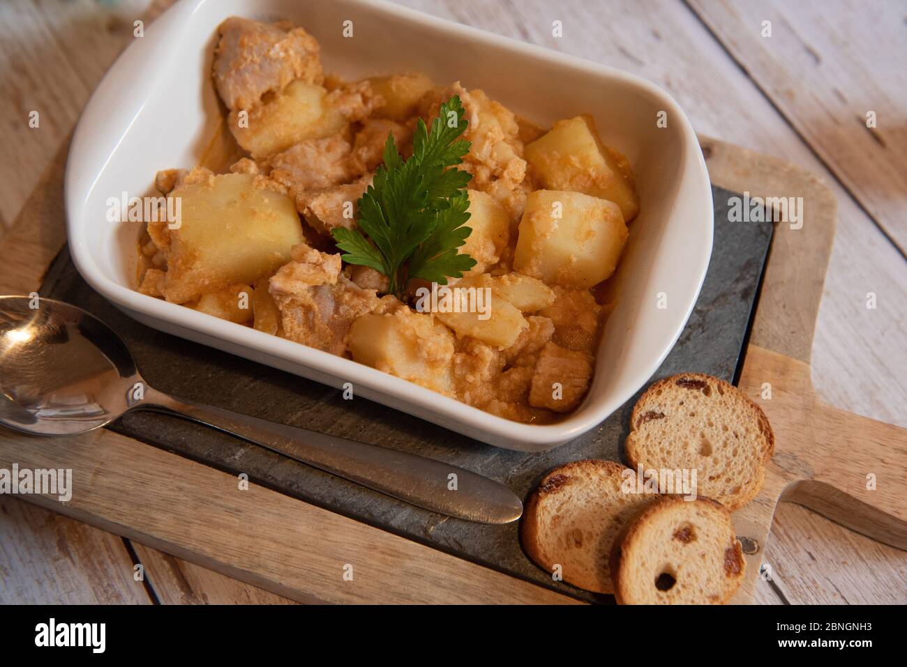 tuna and potato stew called marmitako. Traditional Basque recipe with ...