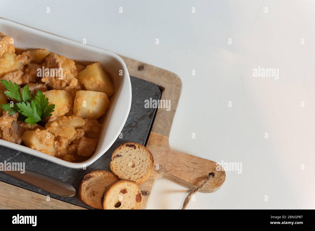tuna and potato stew called marmitako. Traditional Basque recipe with ...