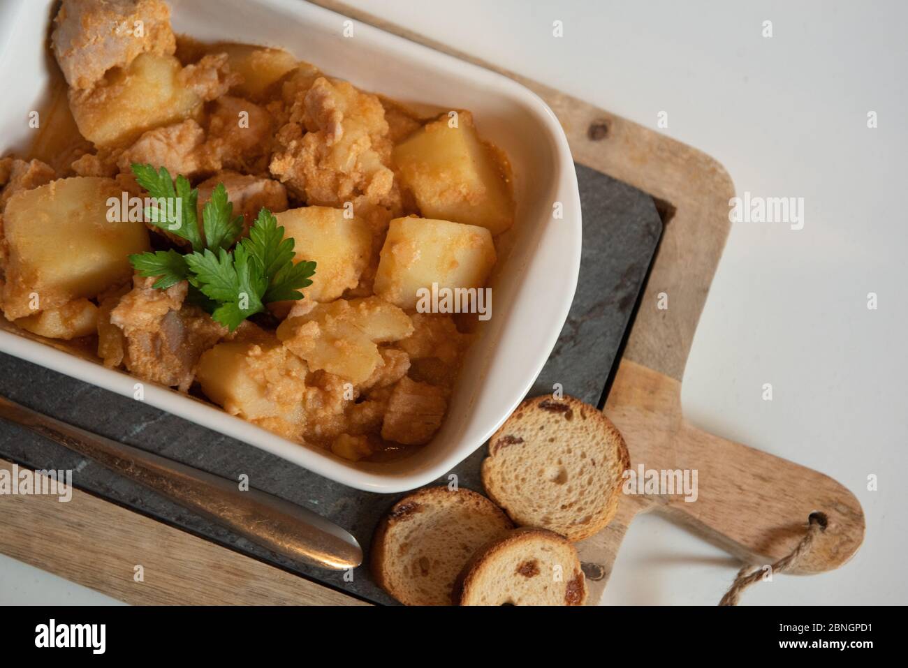 tuna and potato stew called marmitako. Traditional Basque recipe with ...