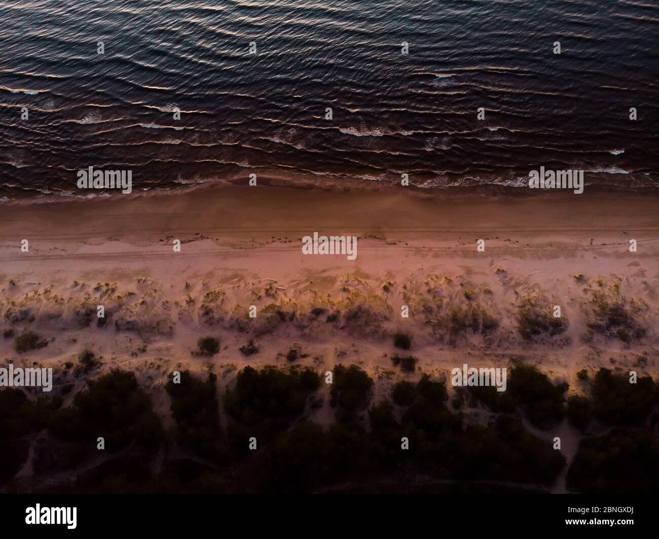 Rich sunset colors of Baltic beach and waves aerial top view Stock ...