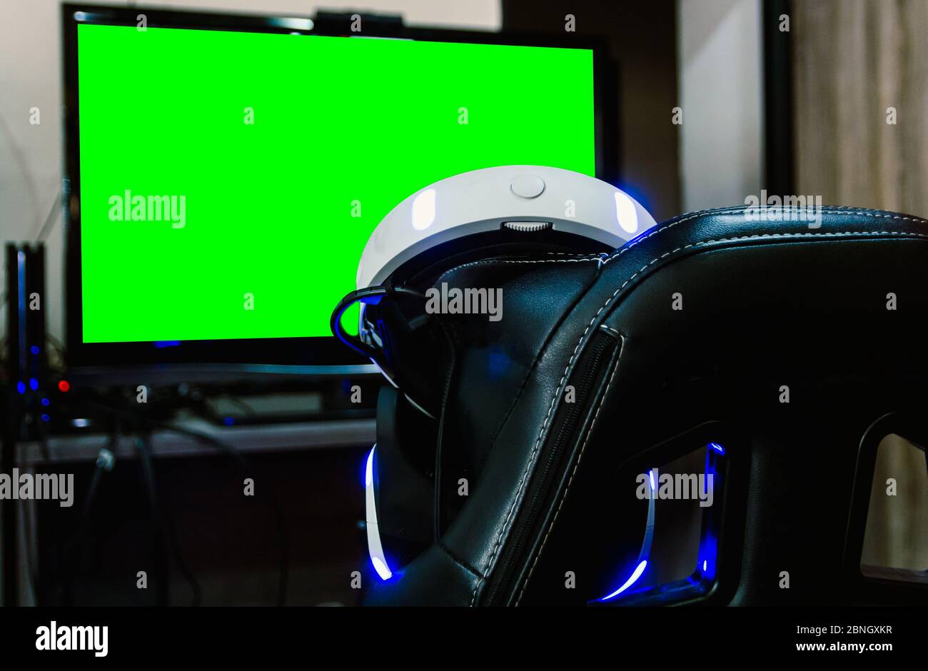 Prepared virtual reality glasses on simulator chair and steering wheel ...