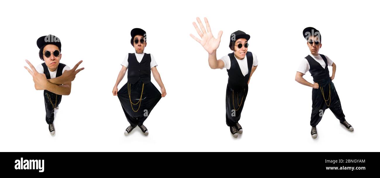 The funny young man dancing isolated on white Stock Photo - Alamy