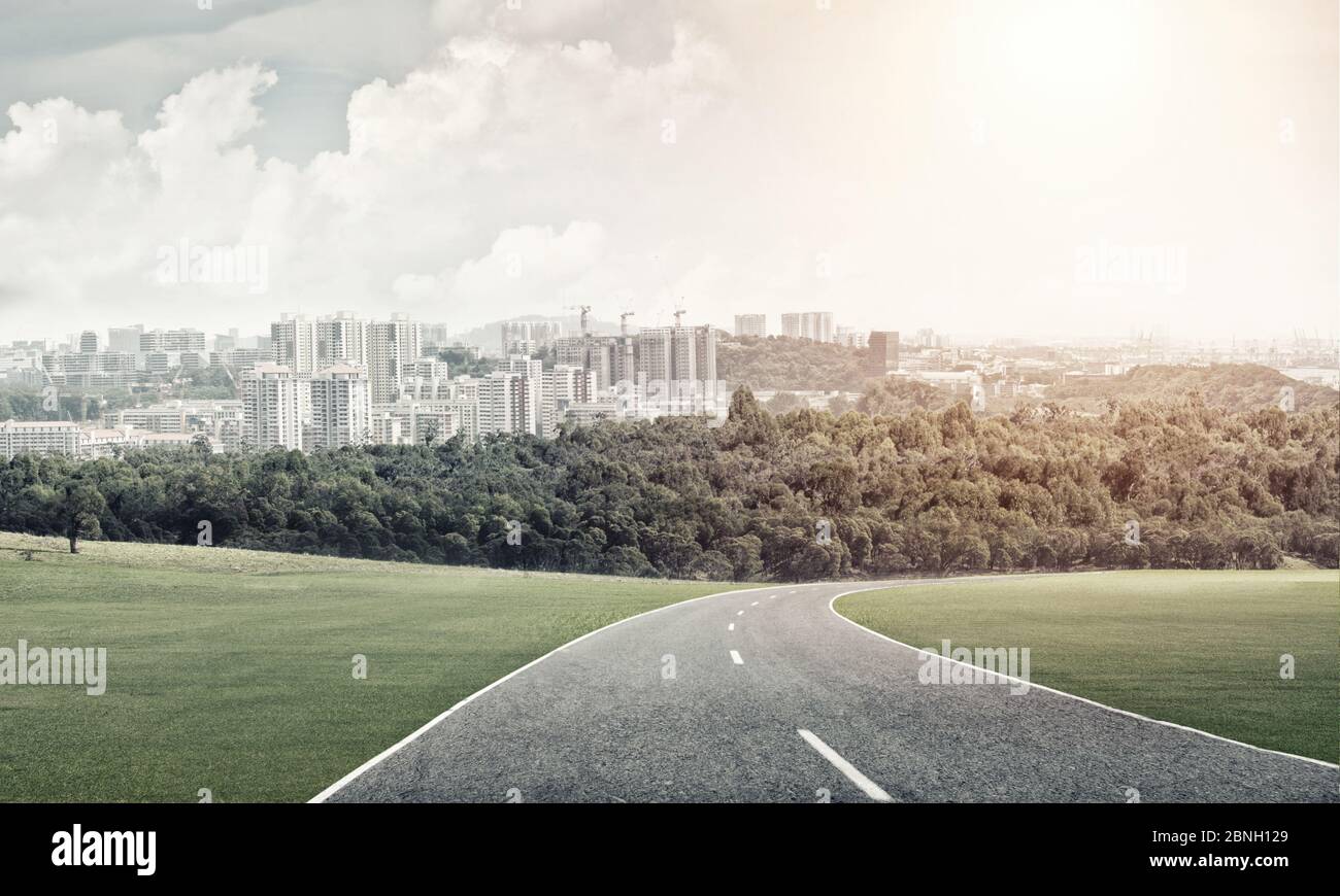 Road to big city Stock Photo - Alamy