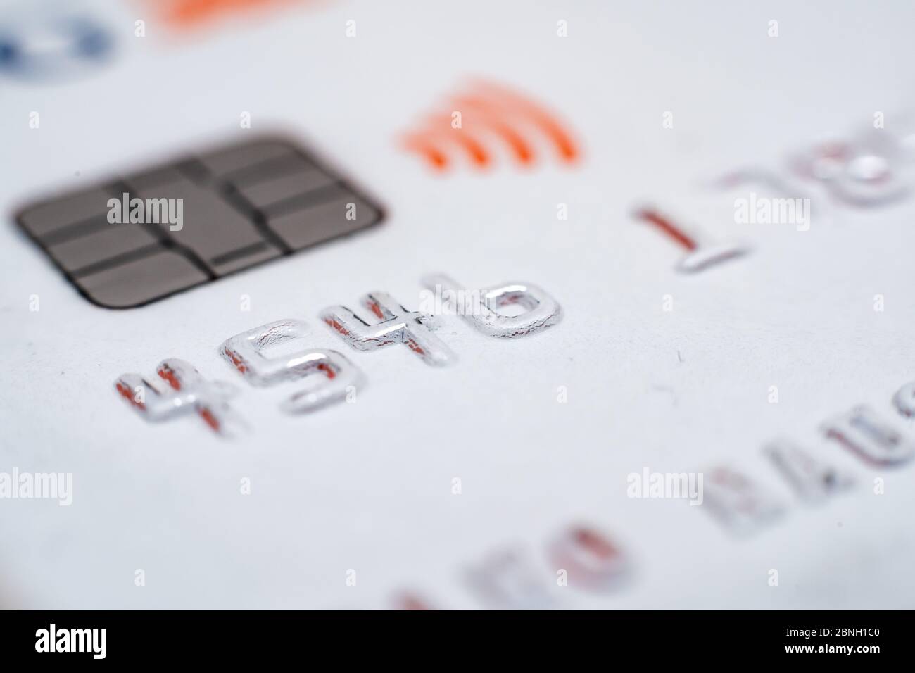 Closeup of a white credit card. Worn out used texture Stock Photo - Alamy