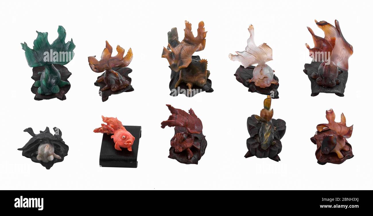 Cool colorful fish statues isolated on the white background Stock Photo ...