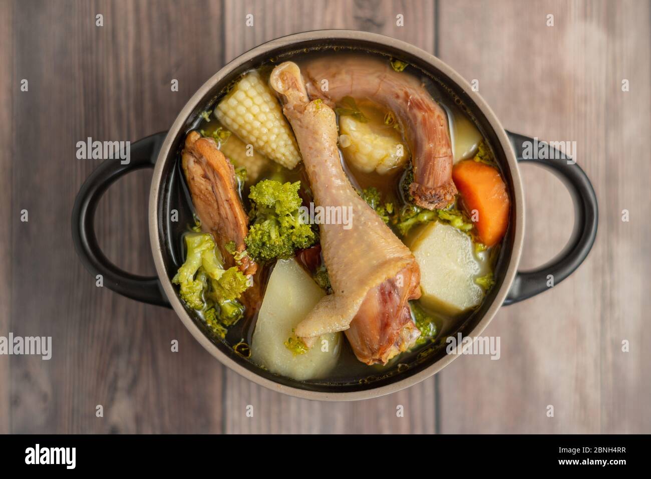Overhead shot of Honduran chicken soup on the table Stock Photo - Alamy