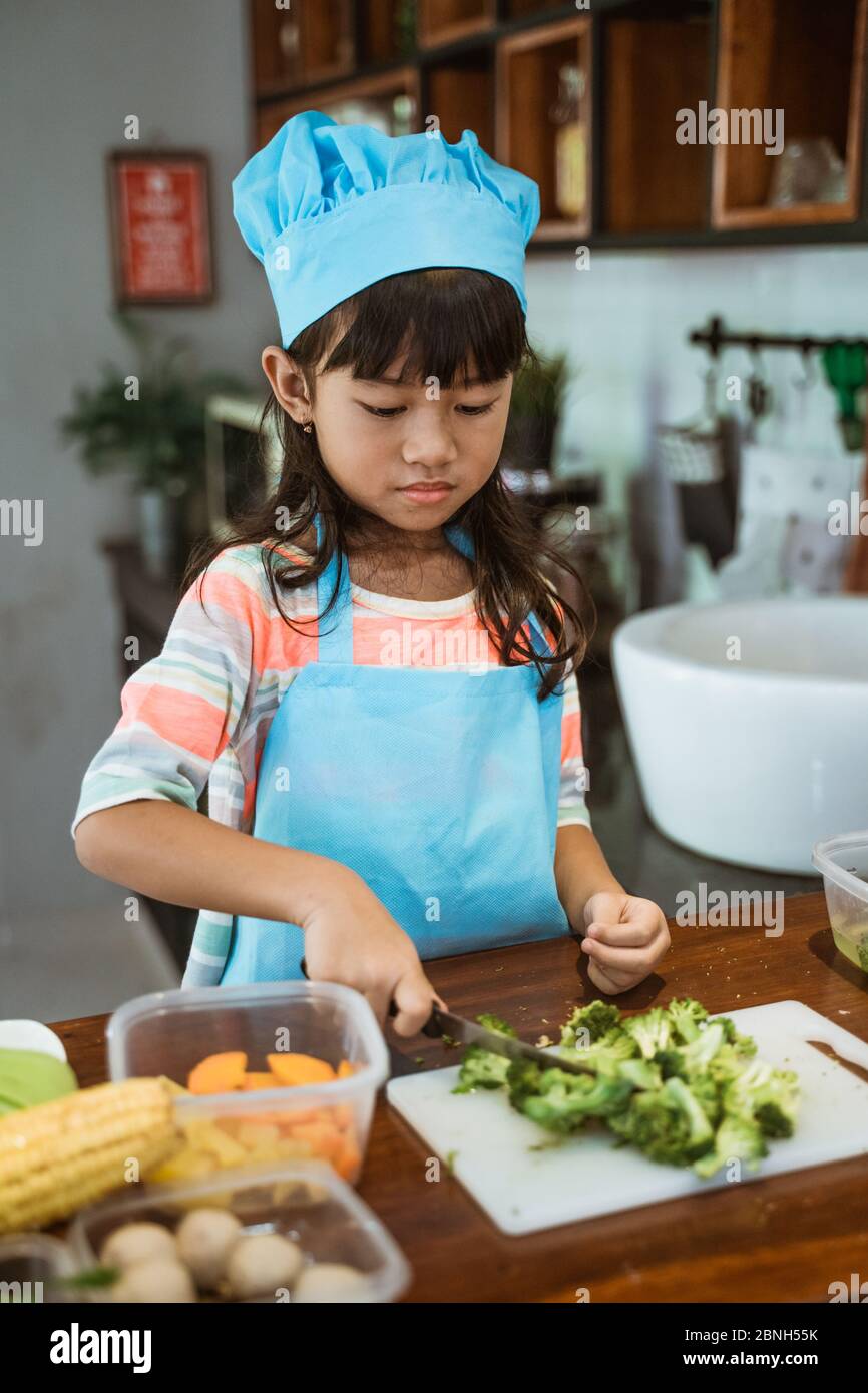 Child asian eating salad hi-res stock photography and images - Alamy