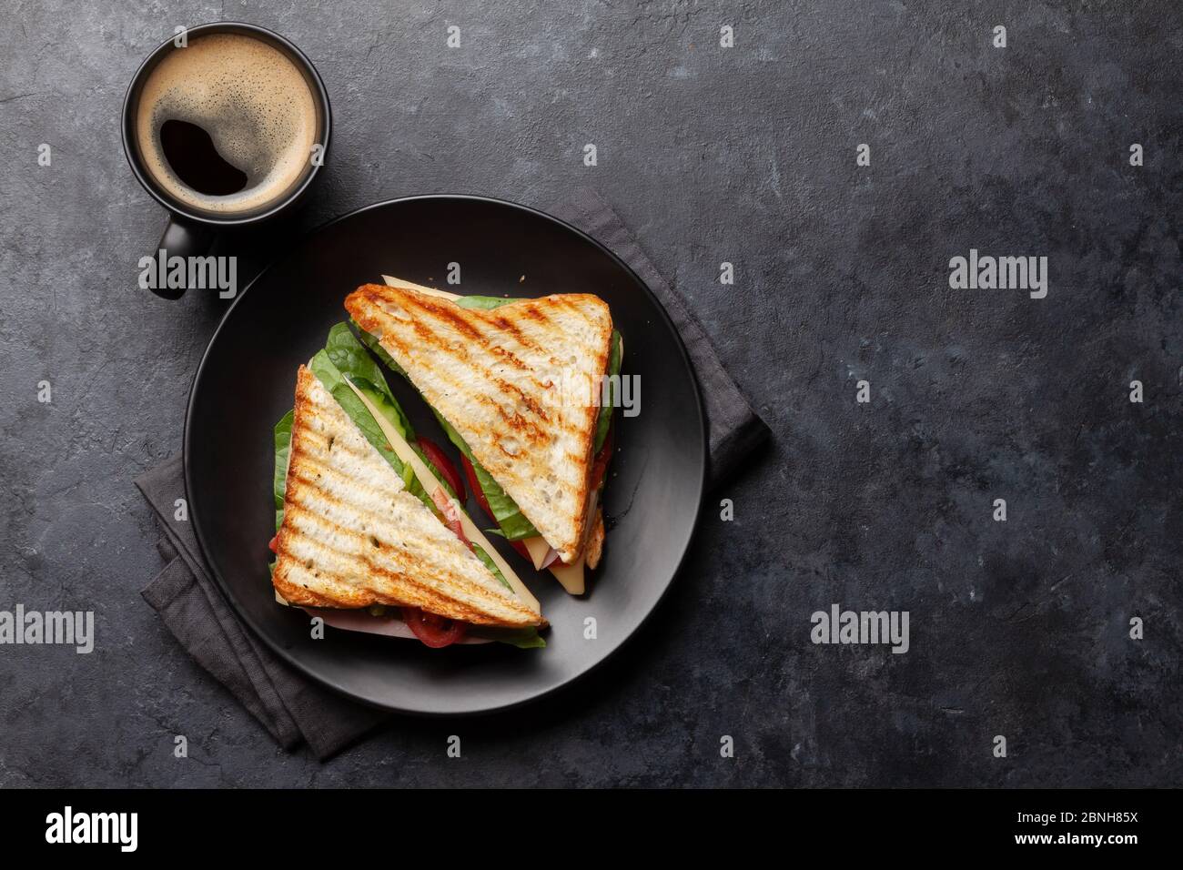 Club sandwich and coffee cup. Breakfast meal. Top view with copy space ...