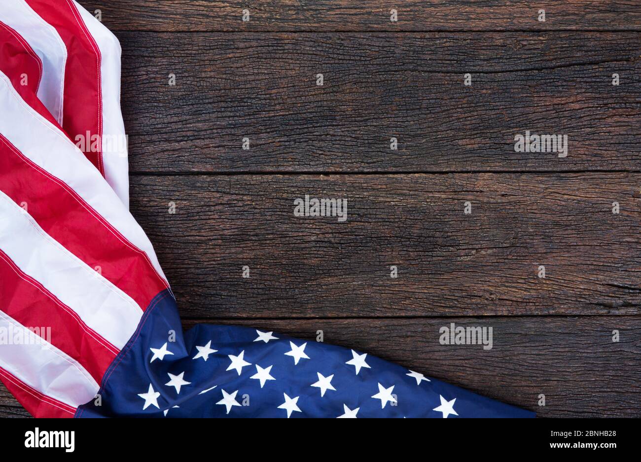 America flag waving pattern on wooden background in table top view, red ...
