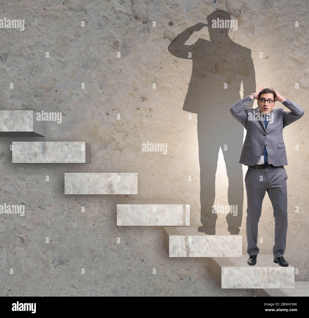 The businessman and his shadow in business concept Stock Photo - Alamy