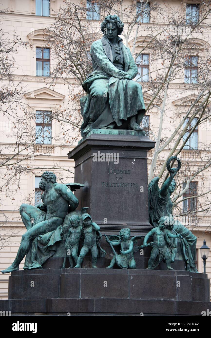 Sculpture of Ludwig van Beethoven in Vienna. Below is an ancient ...