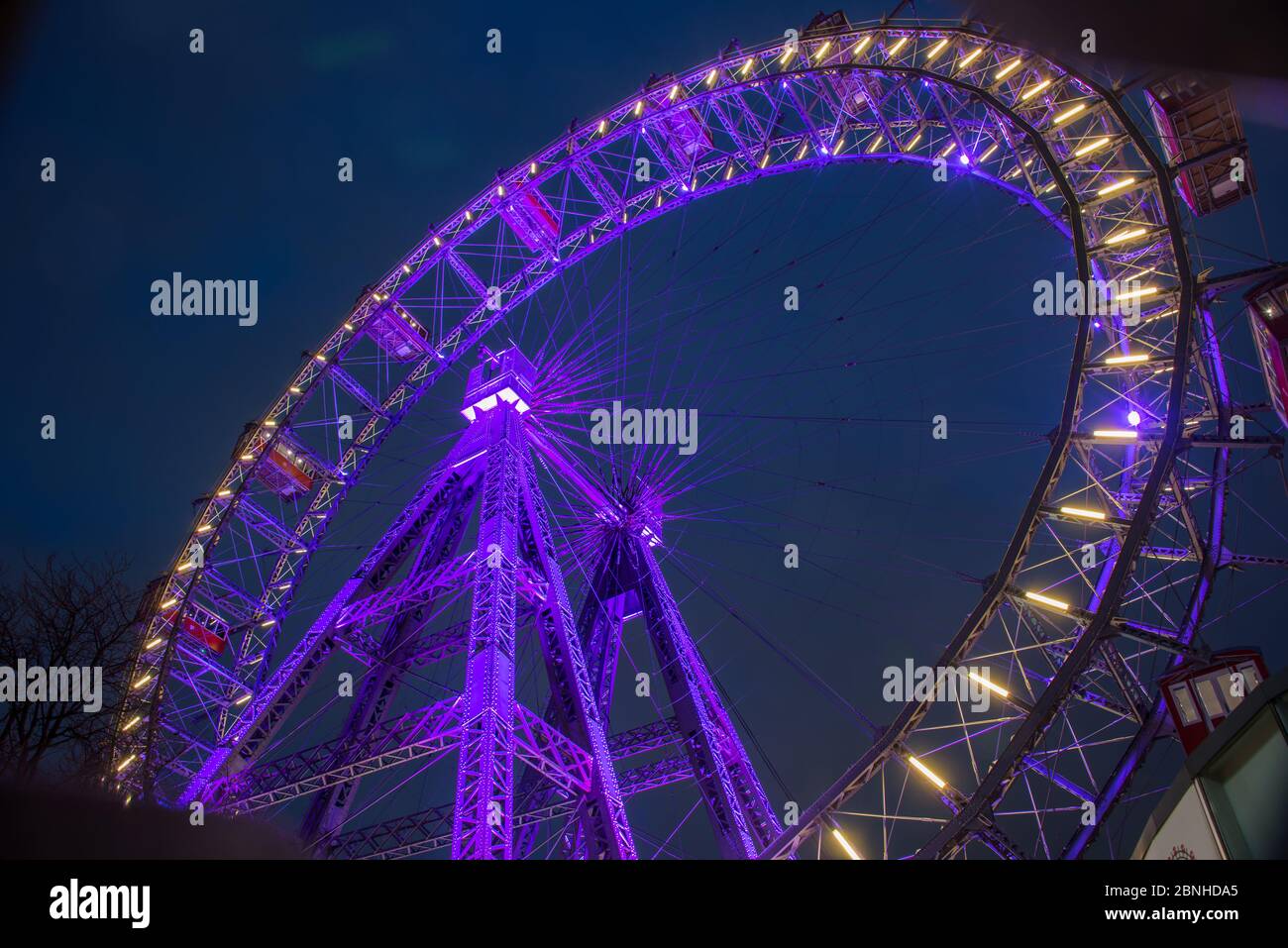 The famous Riesenrad in Prater illuminated at night Stock Photo - Alamy