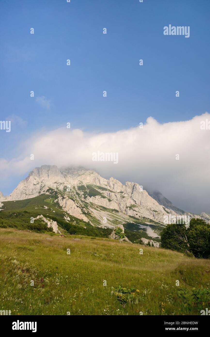 Adiabatic clouds forming above the 2386m peak of mount maglic hi-res ...