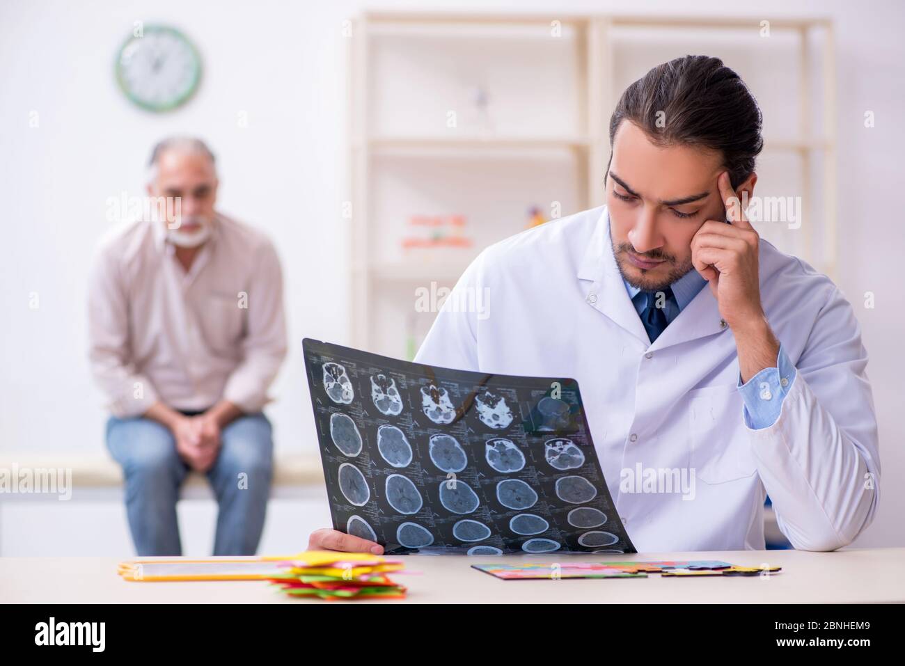 Doctor and patient suffering from the Alzheimer disease Stock Photo - Alamy