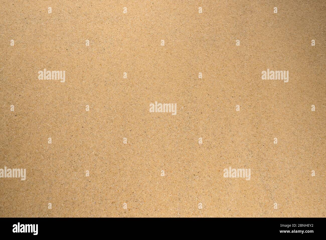 Beige texture. Background of sand with dark splashes Stock Photo - Alamy