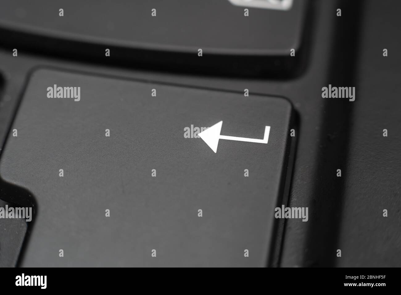 Closeup of a Enter key. Confirmation of data on a computer keyboard ...