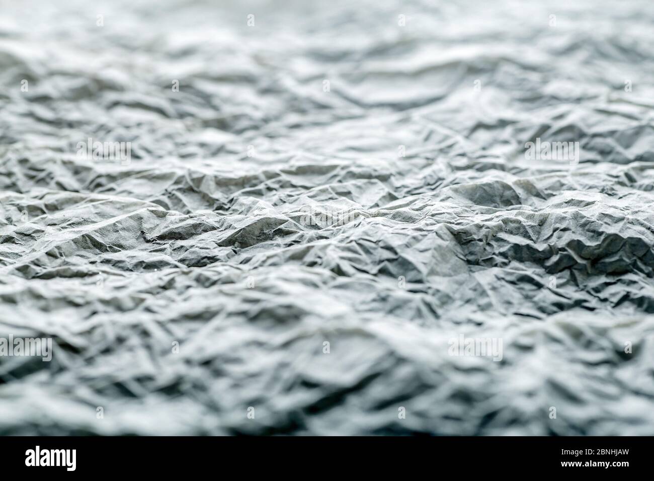 The structure of crumpled paper. Crumpled white paper pattern and ...