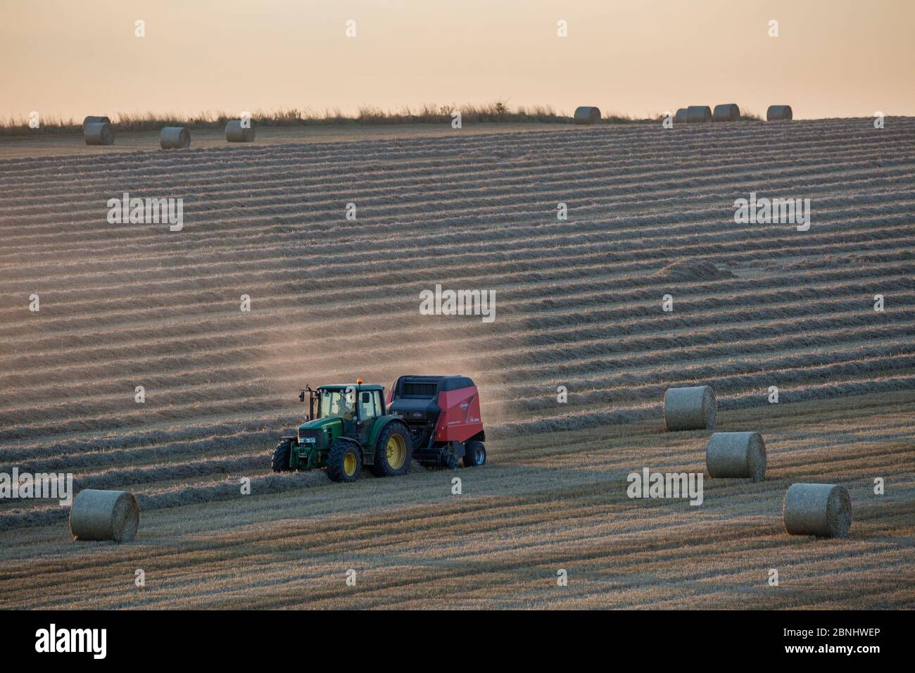 Baling straw during late summer harvest, Hawkesbury Upton ...