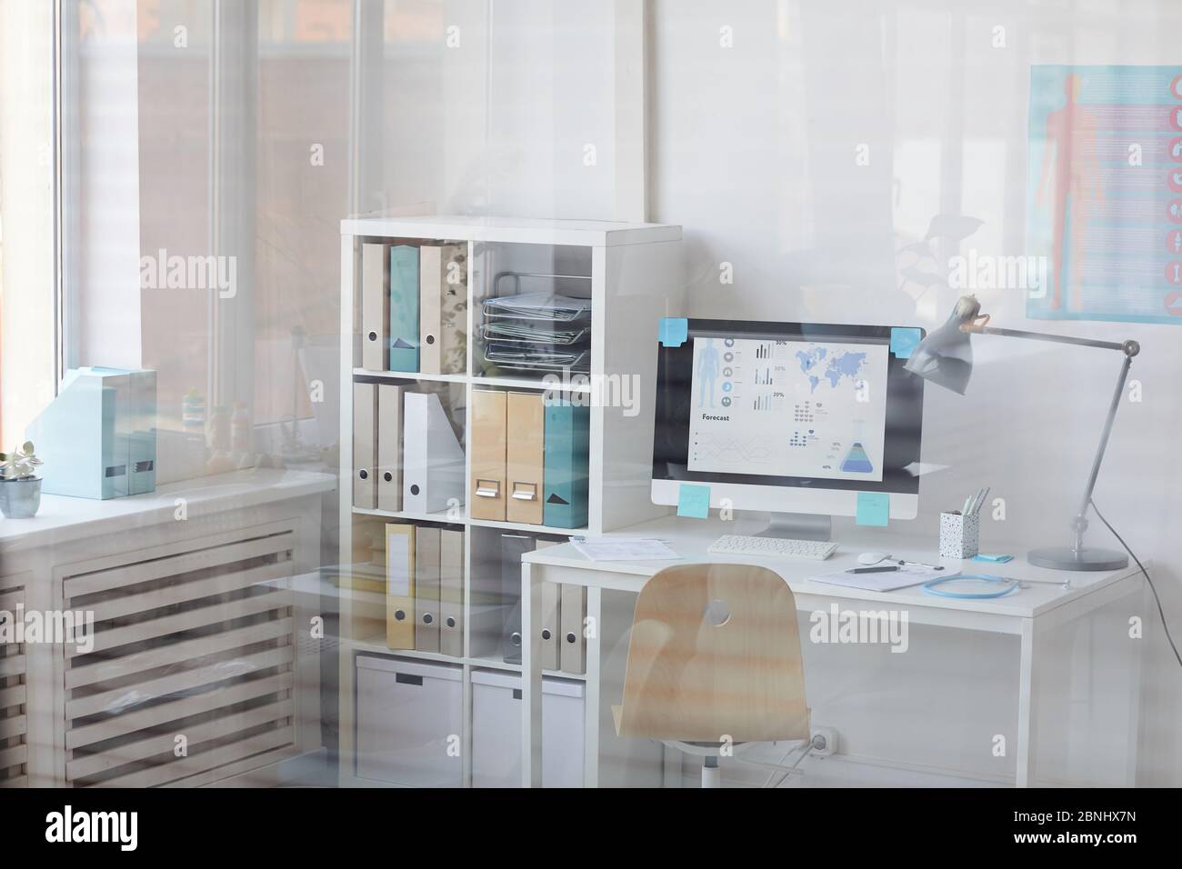 Image of workplace with computer with medical presentation on the ...