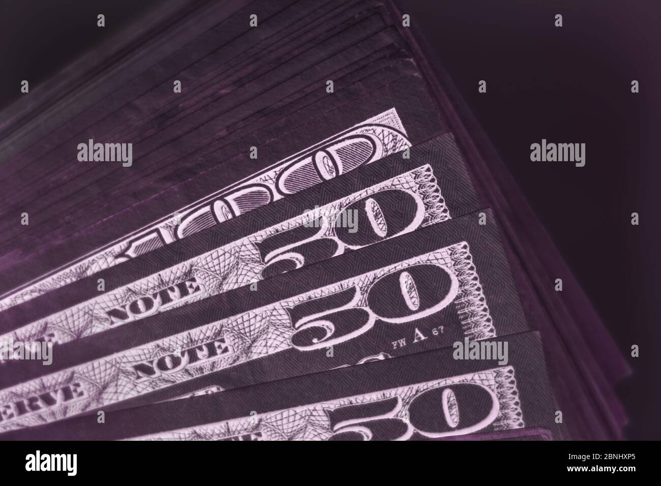 Close up American, US Dollars Cash Money in neon light. Minimalism ...