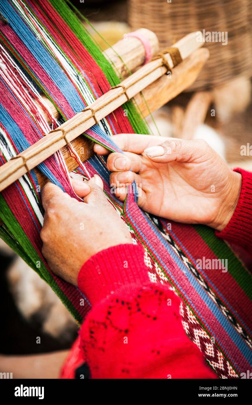 Hands on loom in Planeterra-supported women's weaving project, Huchuy ...